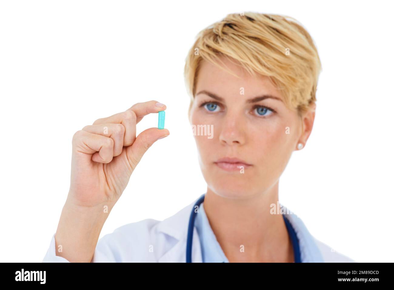 This will make you feel much better. A young female doctor looking at a ...