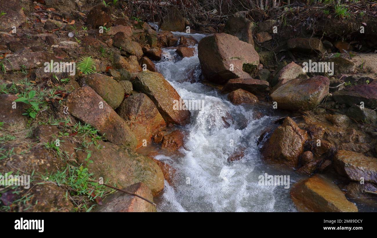 Close-up View, Fresh Water Flowing From The Mountains With River Rocks ...