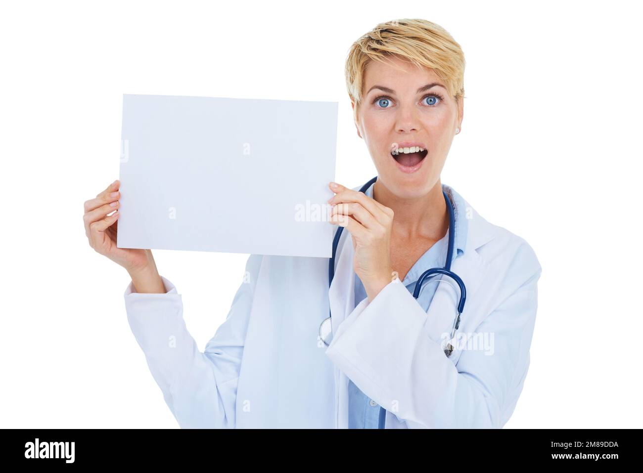 Answering your medical questions. A young female doctor holding up a ...