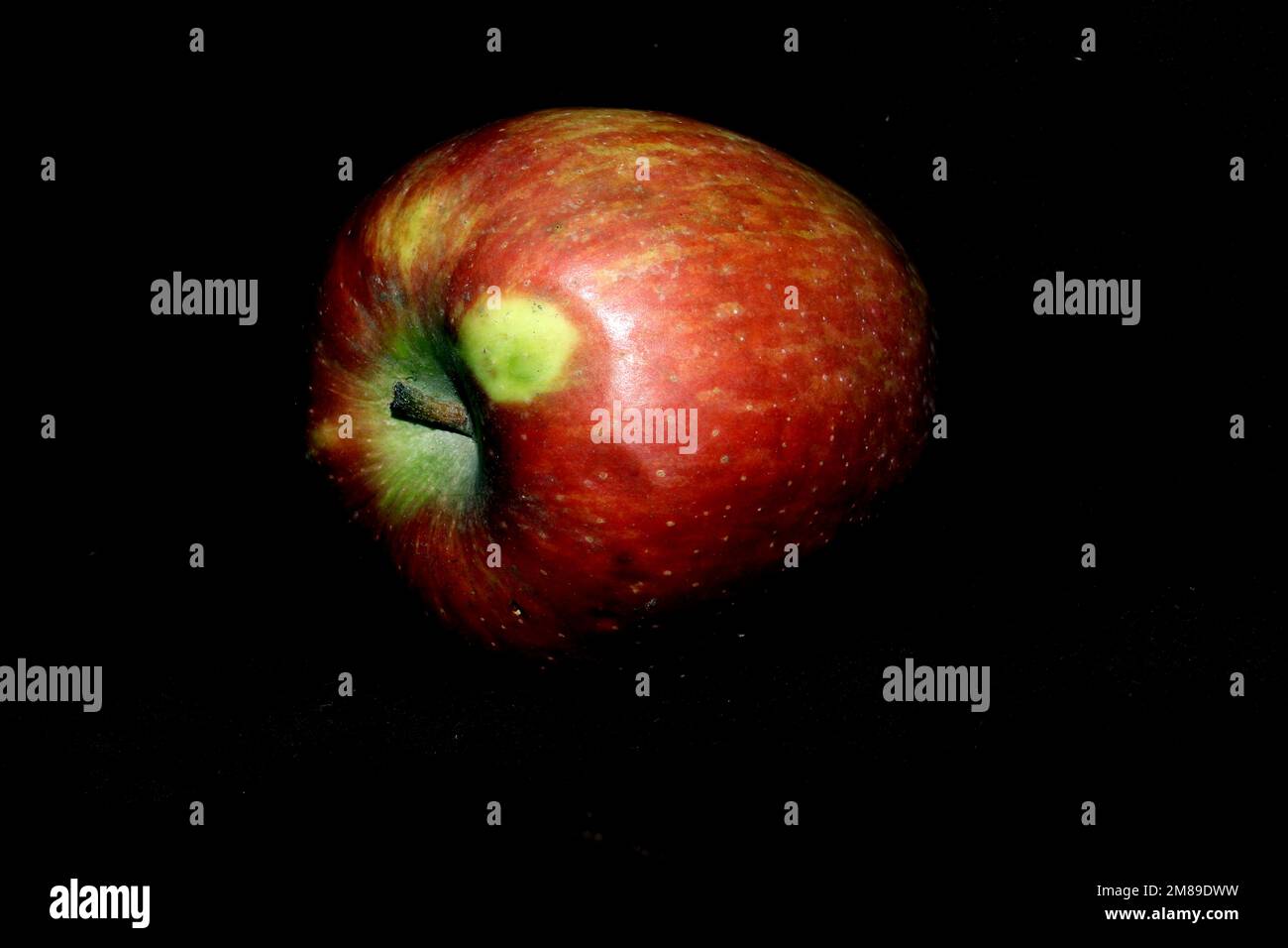 fresh sweet red apple isolated on black background Stock Photo - Alamy