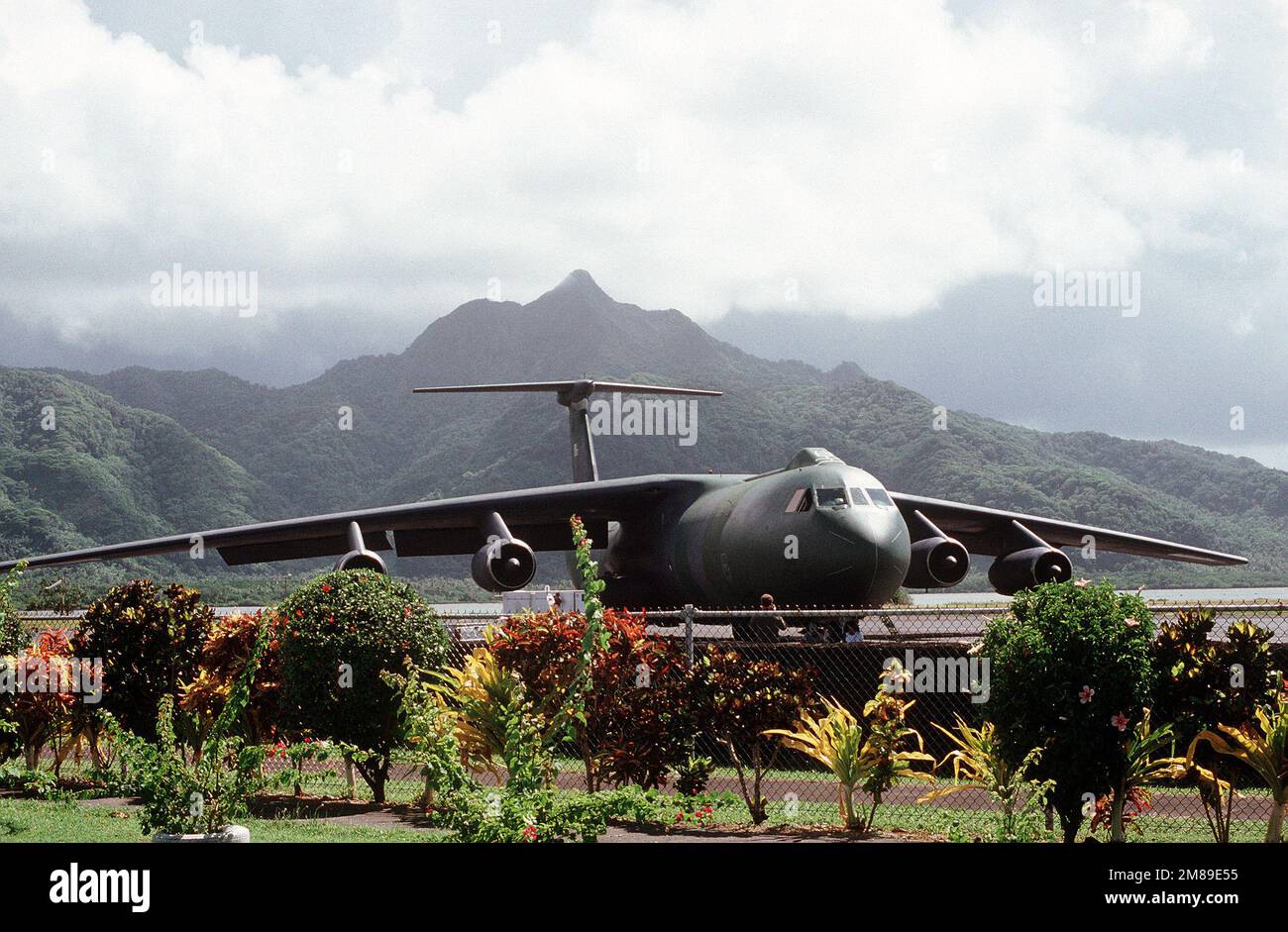 A C-141B Starlifter aircraft prepares for takeoff on the ramp at Pago Pago. Country: American ...