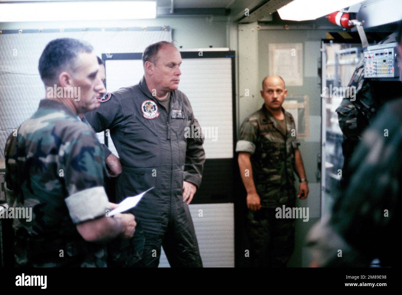 Major General Michael P. Sullivan, center, Deputy Commanding General ...