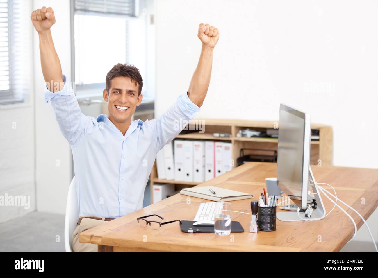 All the hard work is starting to pay off. Portrait of a businessman ...