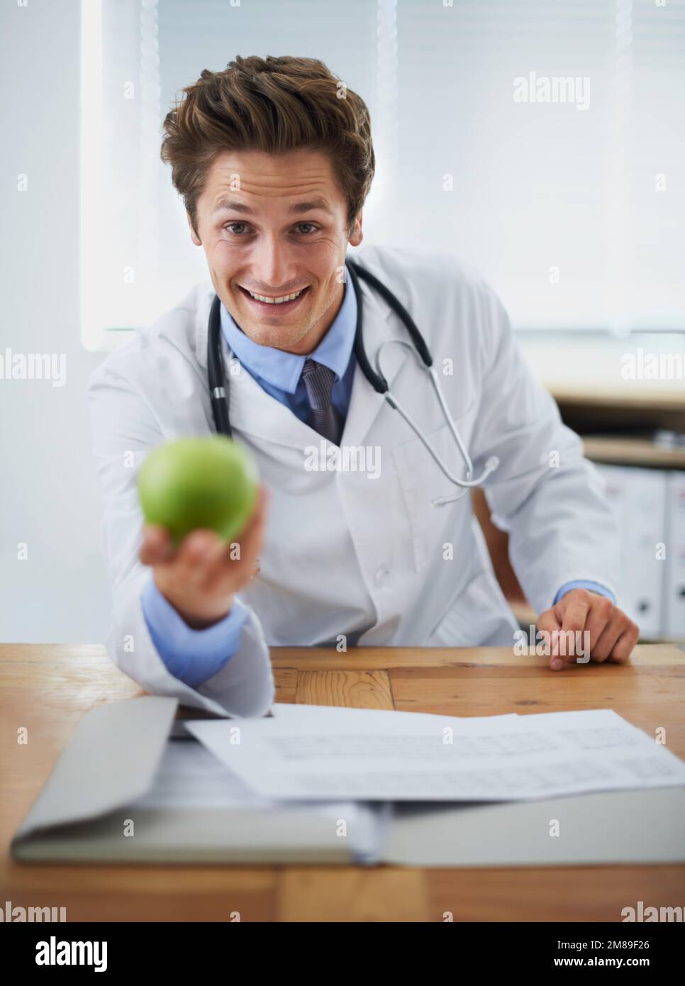 The easiest way to better health. Portrait of a positive young doctor ... The easiest way to better health. Portrait of a positive young doctor ...