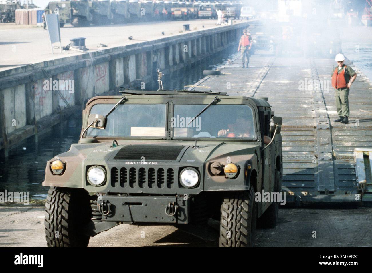 Marines unload M998 High-Mobility Multipurpose Wheeled Vehicle (HMMWV ...