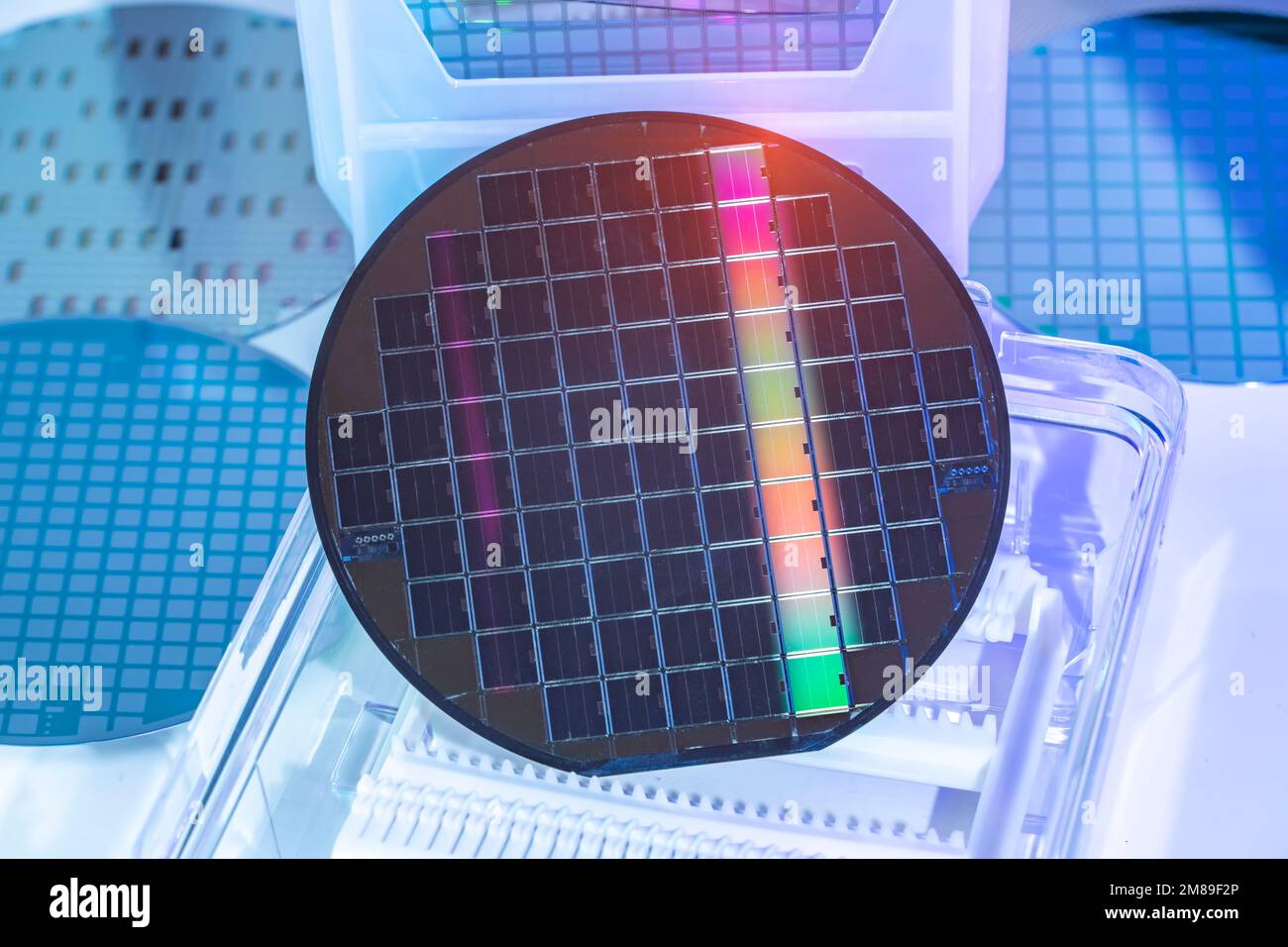 patterned silicon wafers in a universal pod. Electronic circuit designs ...