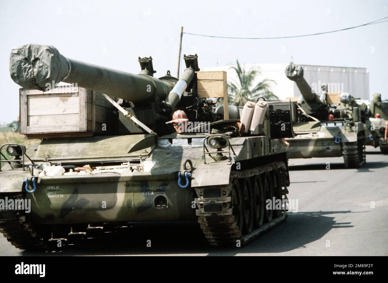 M-110A1 8-inch self-propelled howitzer down a roadway during exercise ...