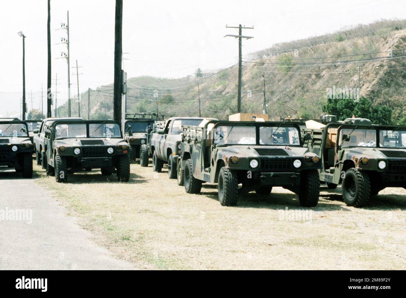 M998 High-Mobility Multipurpose Wheeled Vehicle (HMMWV) and M880 light ...