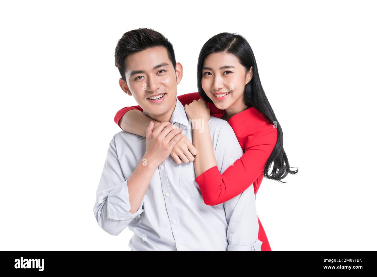 Young lovers behind hug Stock Photo - Alamy