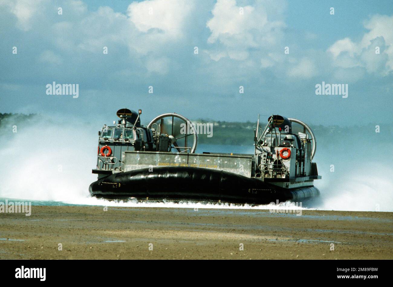 The air cushion landing craft LCAC-9 comes ashore during exercise Ocean ...