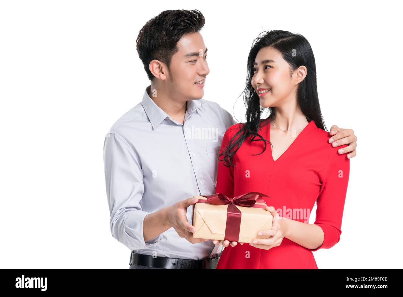 Behind the young lovers embrace gifts Stock Photo - Alamy