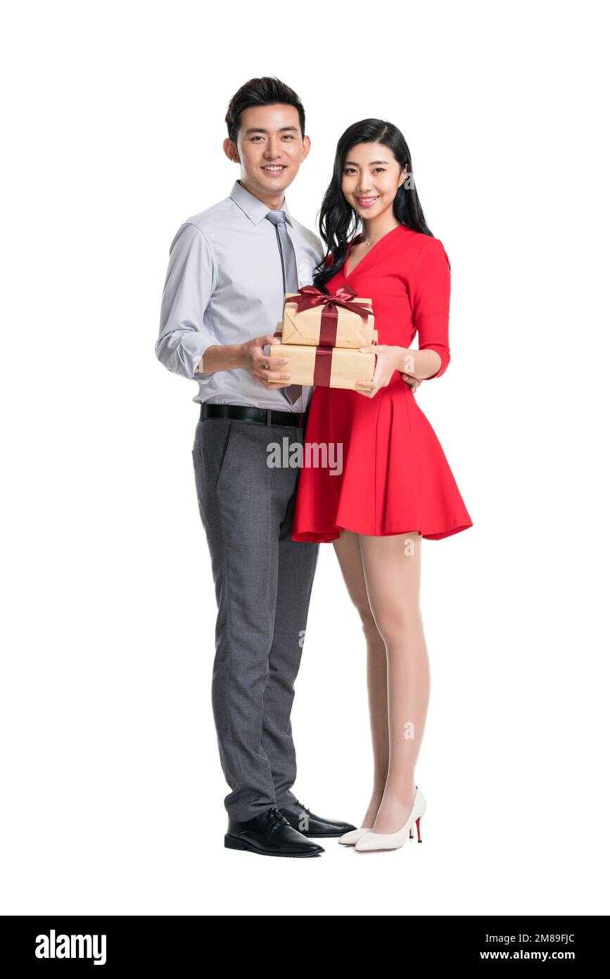 Young lovers hug gifts Stock Photo - Alamy