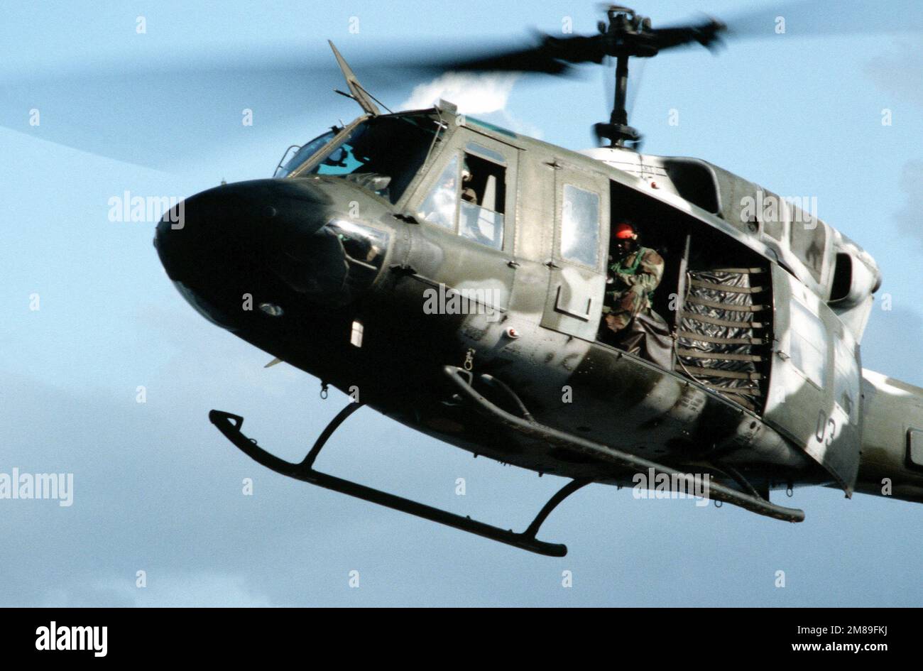 A UH-1N Iroquois helicopter from Marine Utility/Attack Helicopter ...
