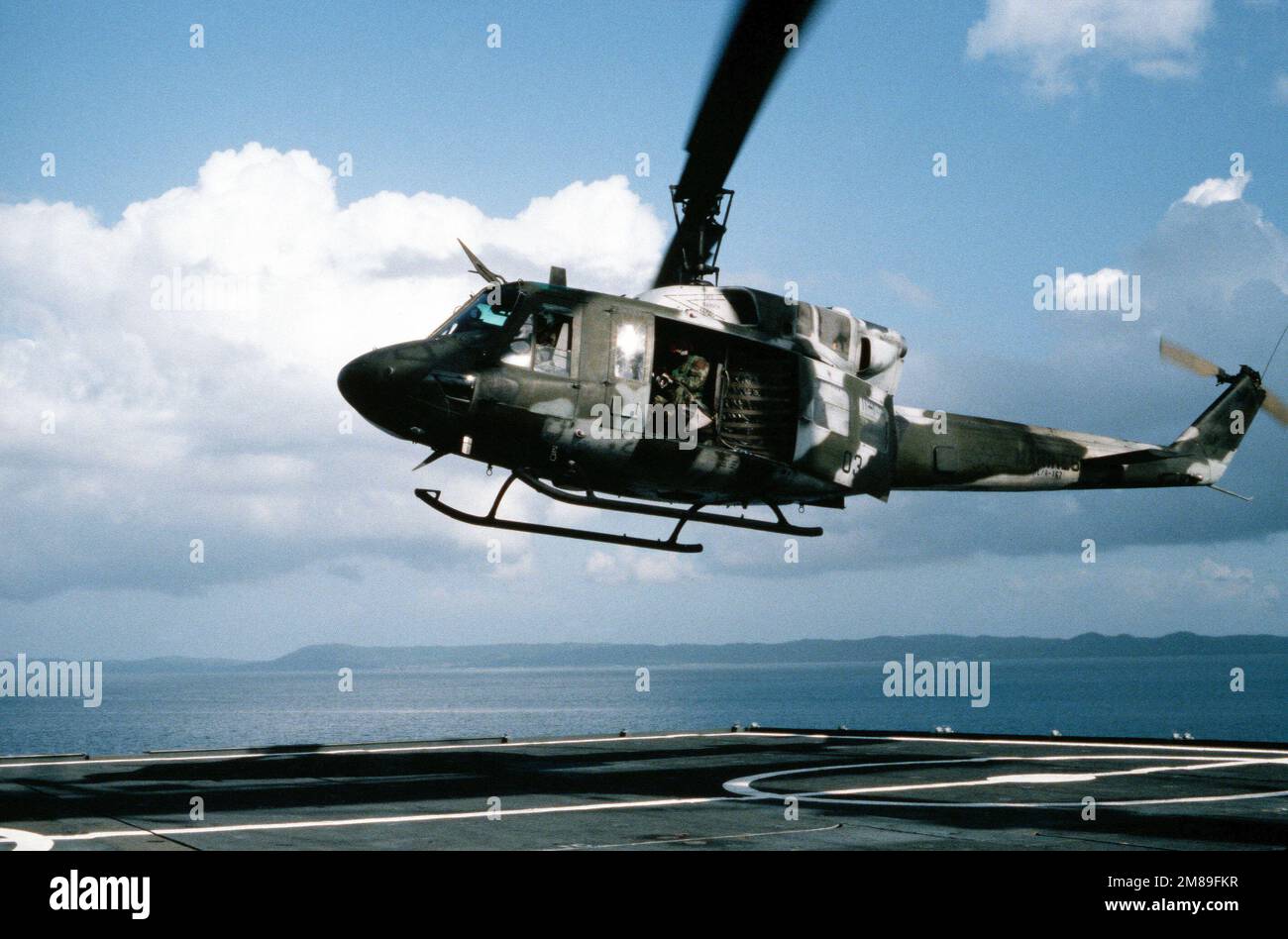 A UH-1N Iroquois helicopter from Marine Utility/Attack Helicopter ...