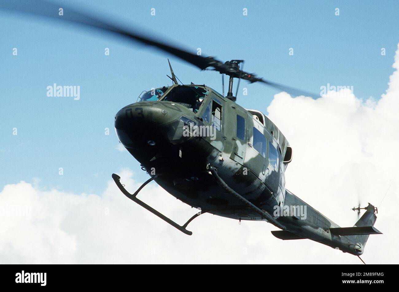 A UH-1N Iroquois helicopter from Marine Utility/Attack Helicopter ...