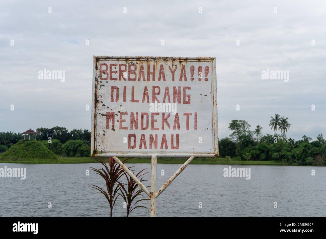 Danger sign prohibited from approaching the lake close up Stock Photo ...