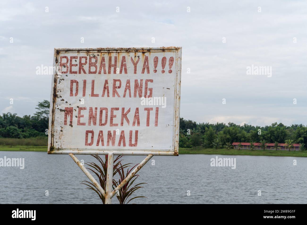 Danger sign prohibited from approaching the lake close up Stock Photo ...