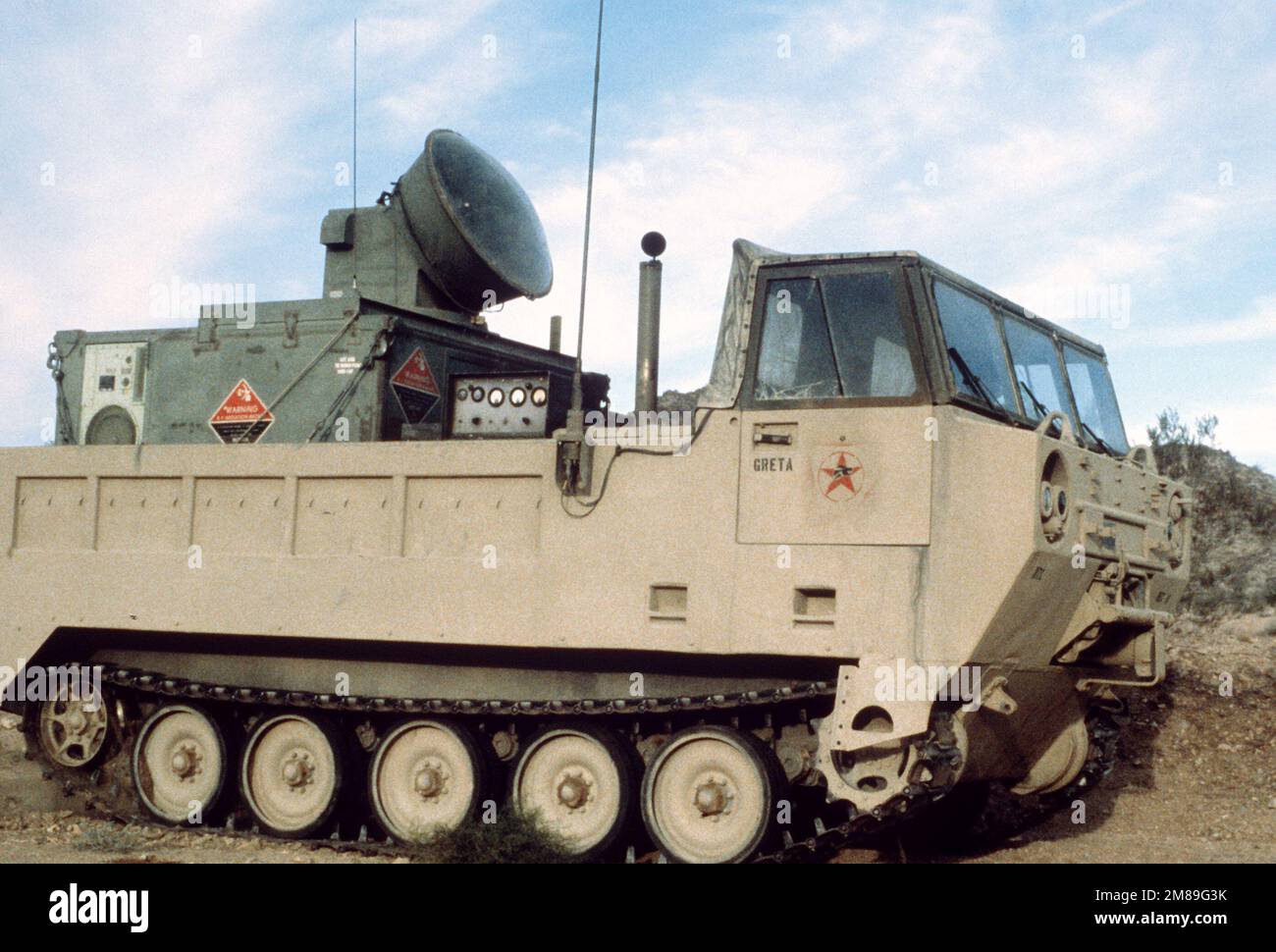 An M-548 tracked cargo carrier equipped with a tactical radar threat ...