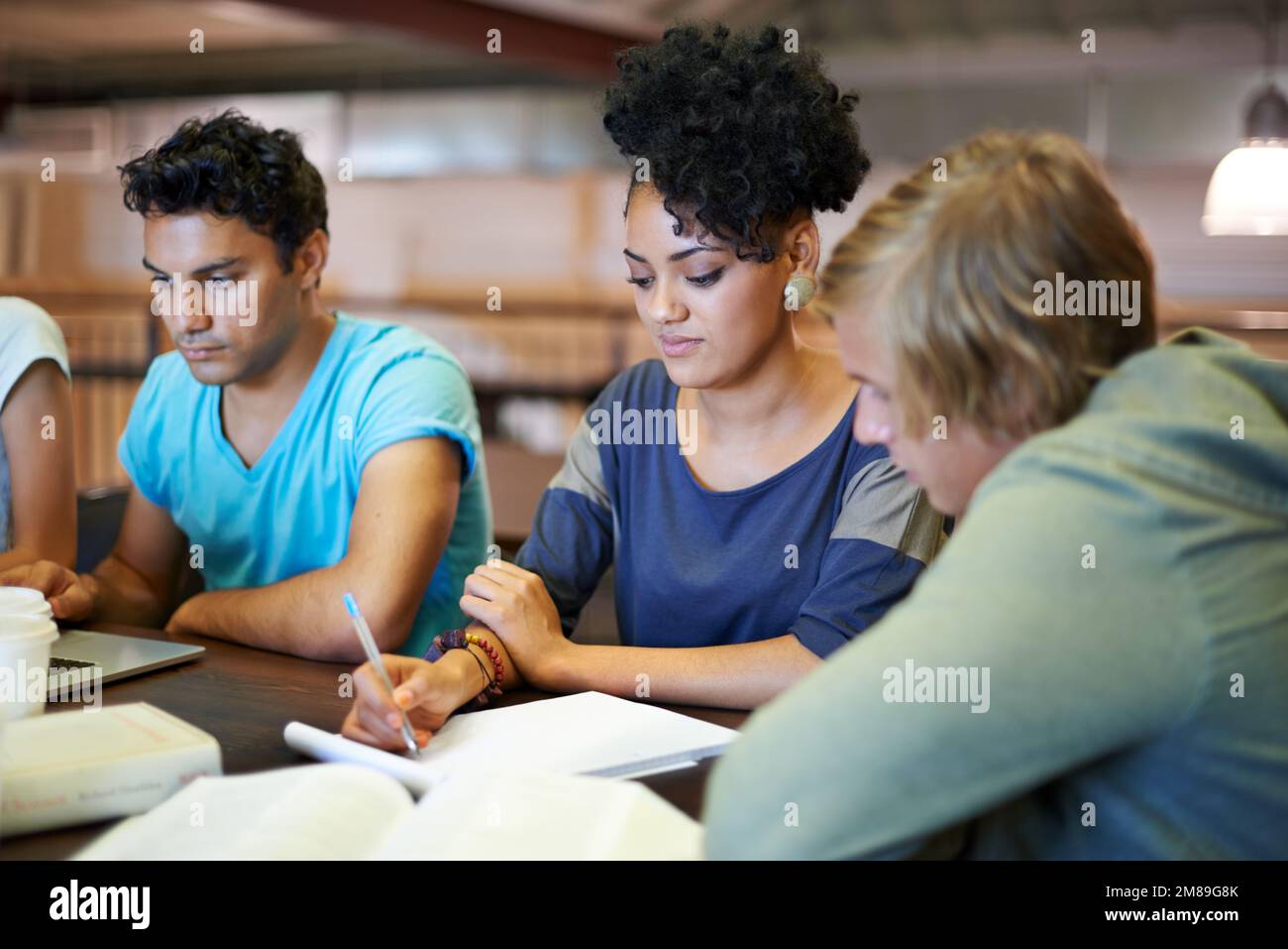 Working together to prepare for finals. A group of young people ...