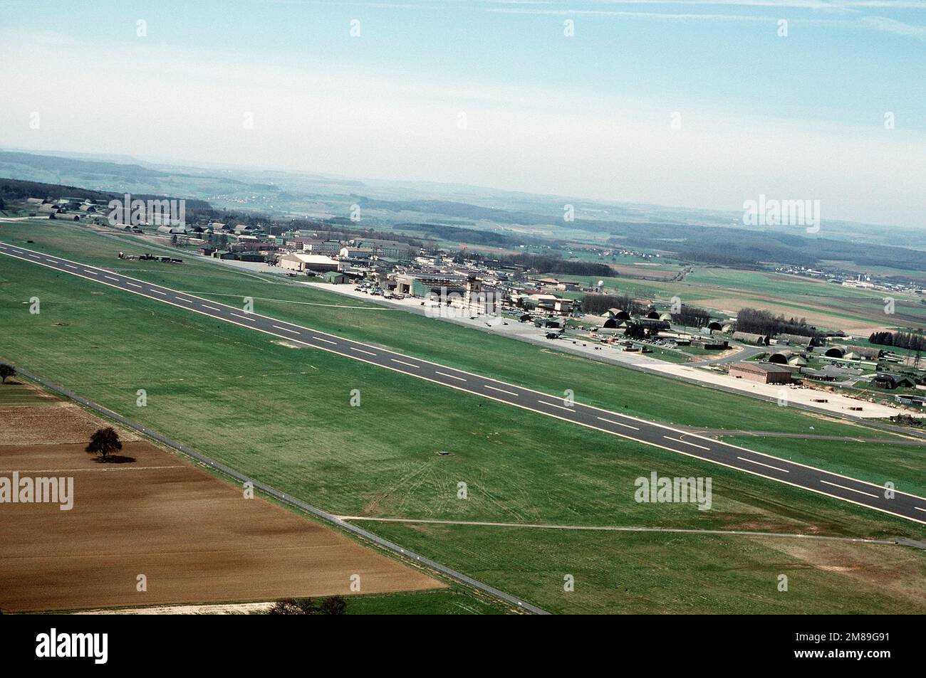 An aerial view of the runway and some facilities on the base. Base ...