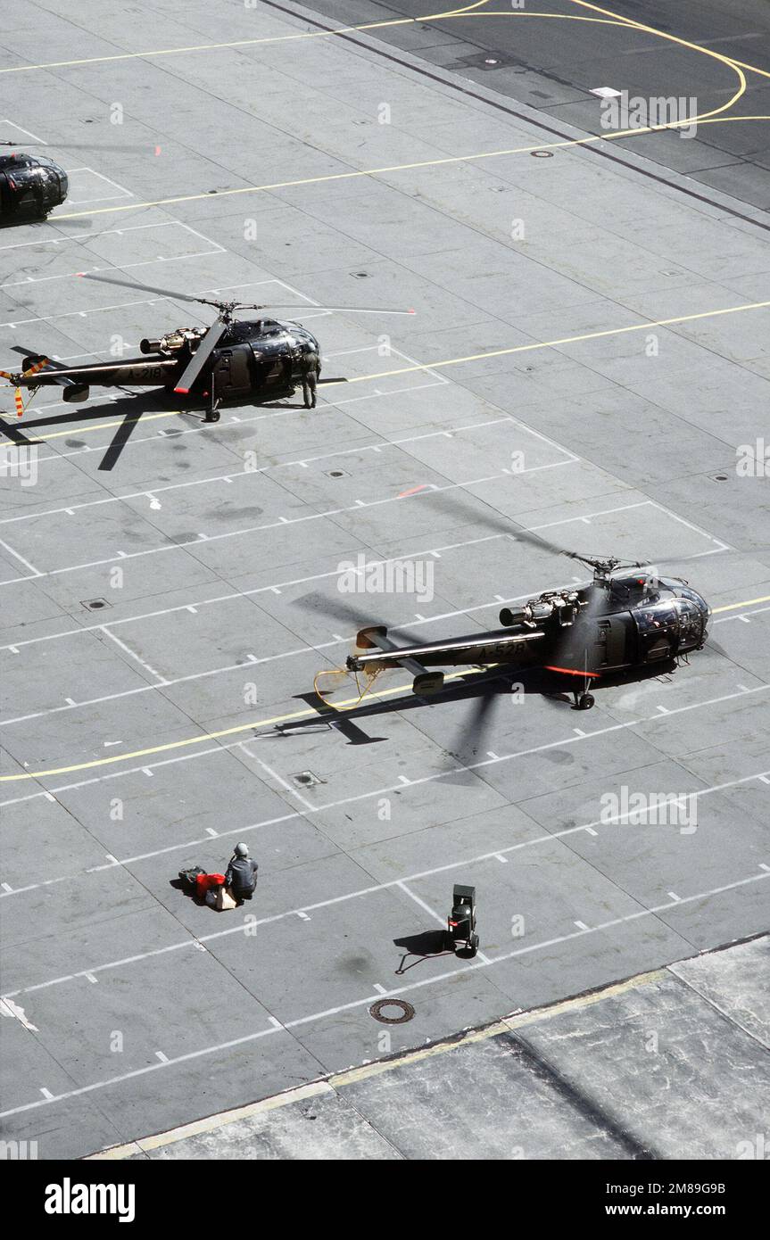 Three Dutch air force Alouette III helicopters are readied for flight ...