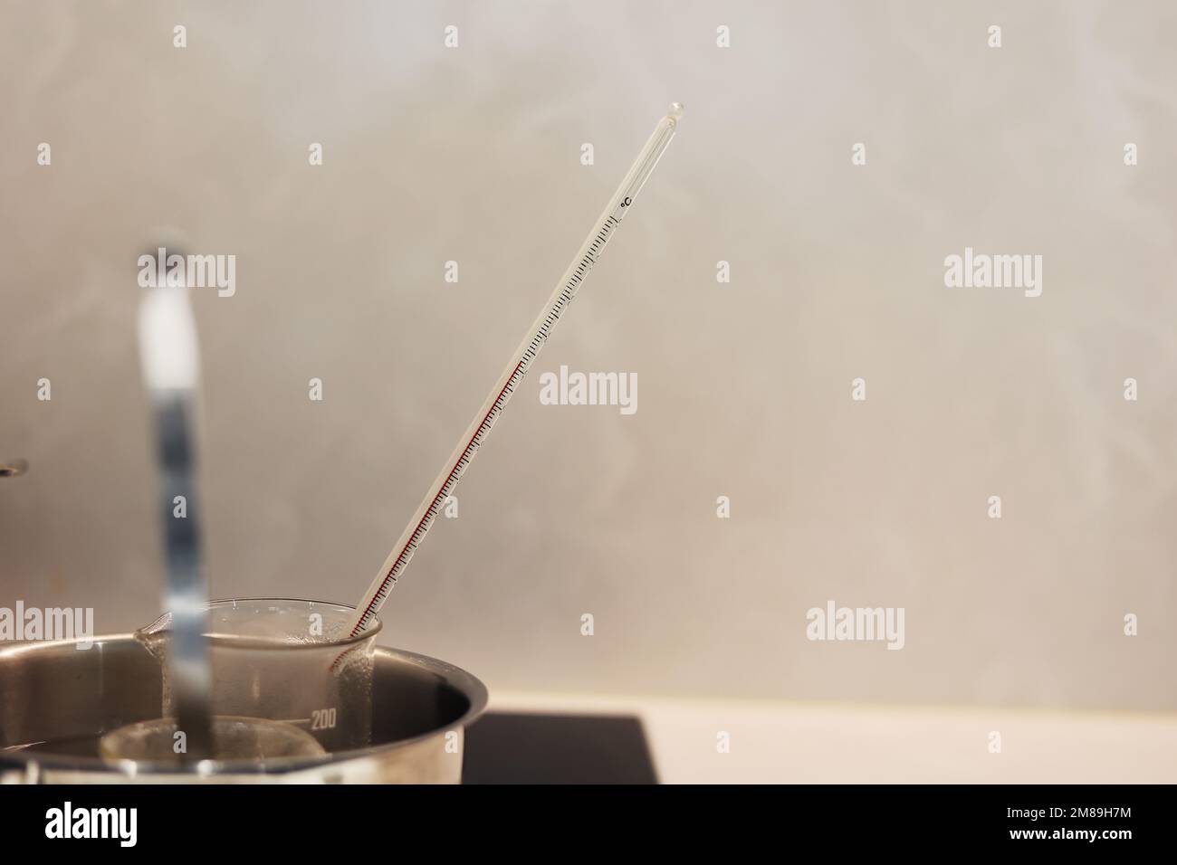 Heat beakers of water and jojoba oil in boiling water, record a high ...