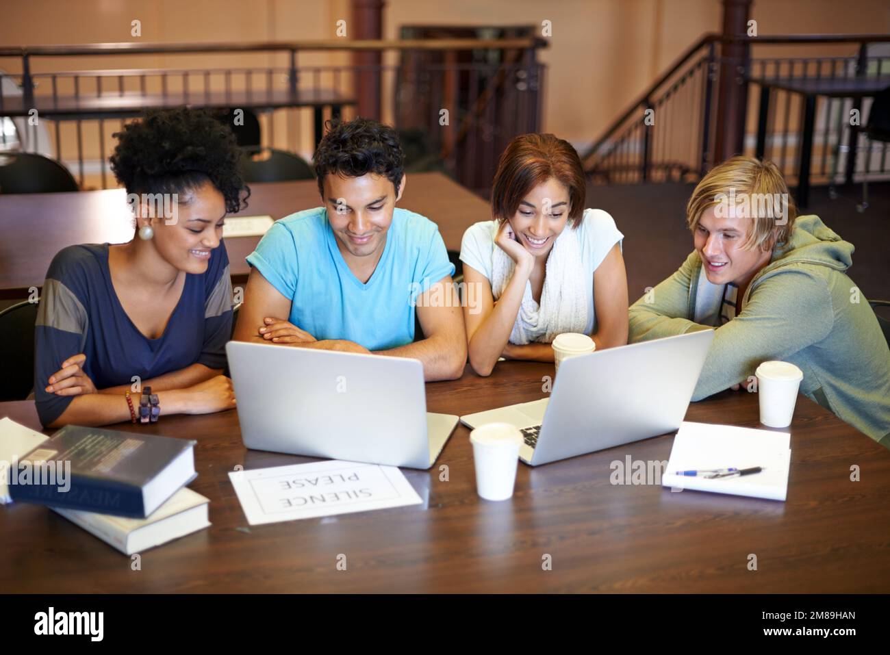 Working together to prepare for finals. A group of young people ...
