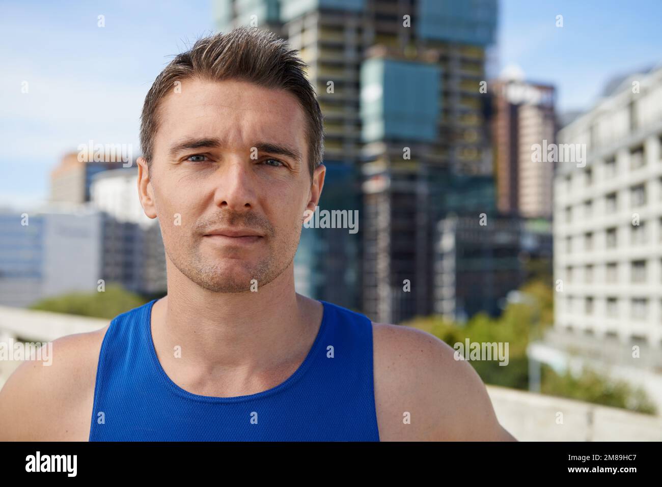 Exercise is his recreation. Portrait of a young man ready for a active ...