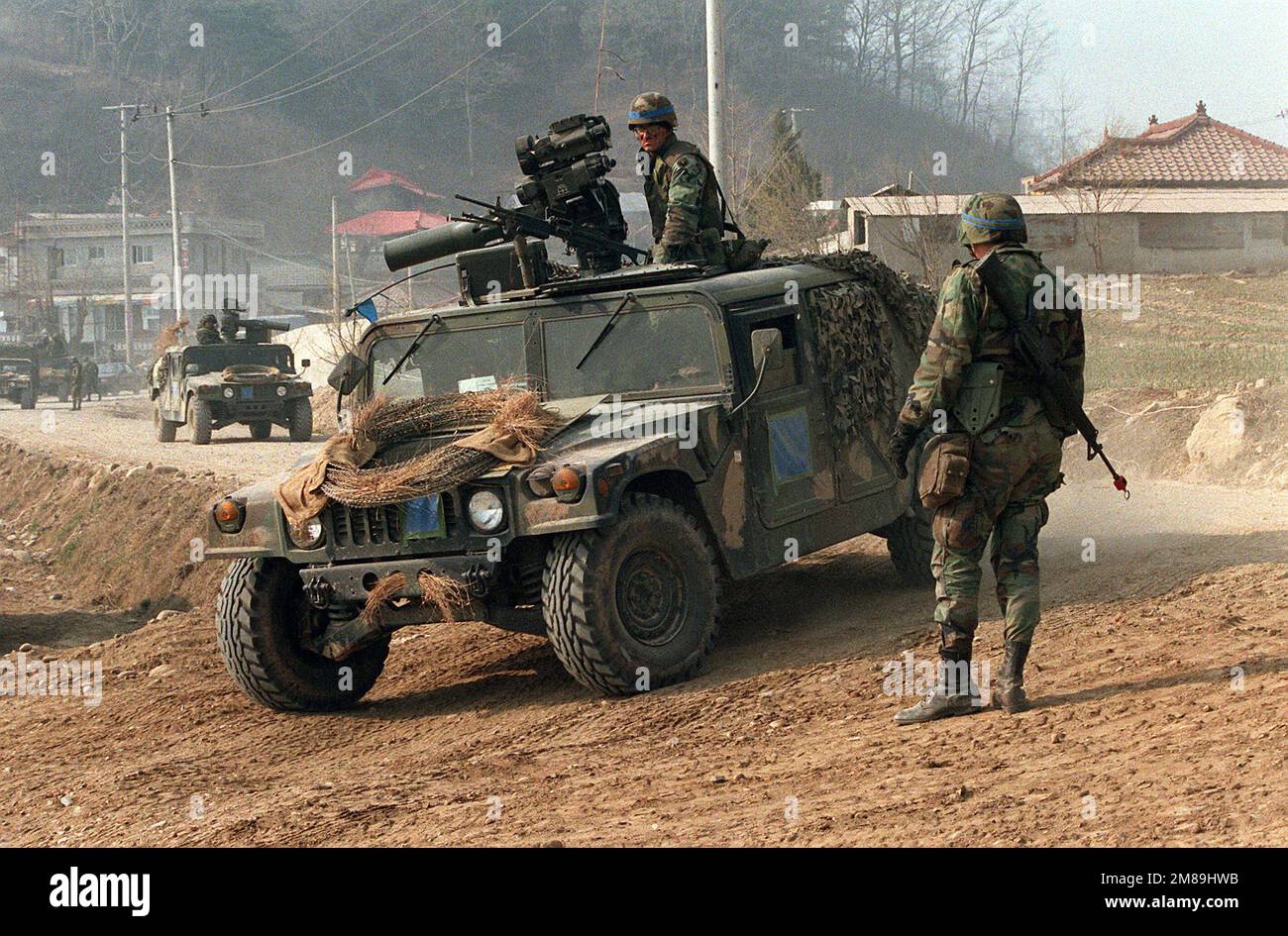 A 9th Infantry Division soldier stands behind the TOW-2 Tube-launched ...