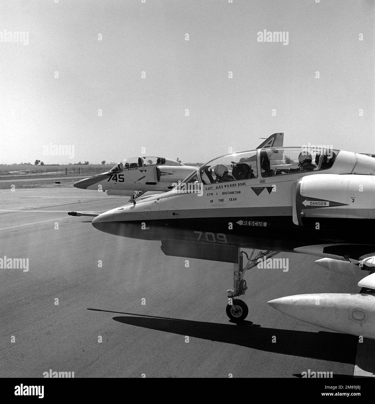 Training Squadron 7 (VT-7) pilots conduct preflight checks on their TA ...