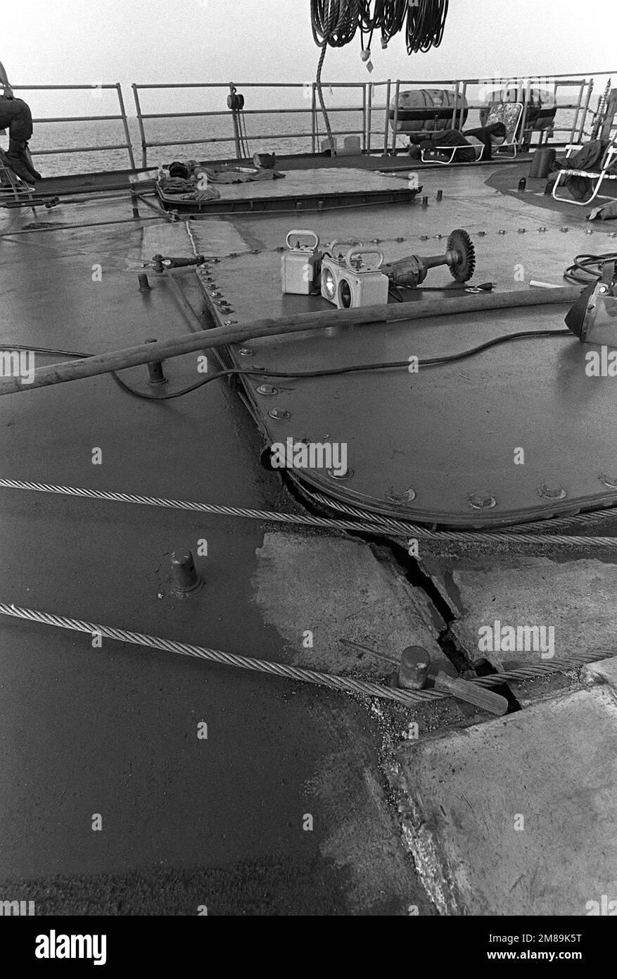 A close-up view of the crack in the starboard weather deck of the ...