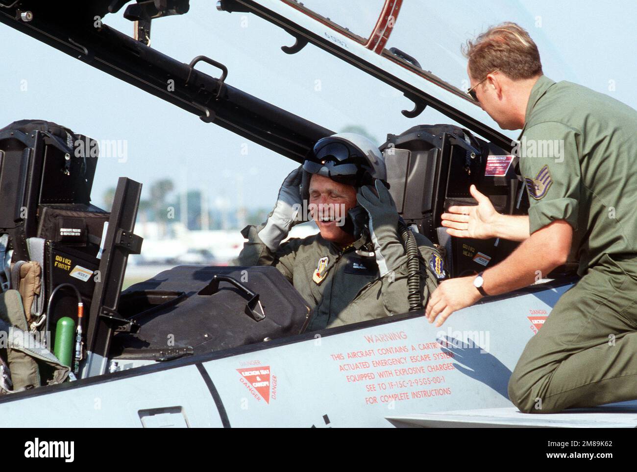 Rep. Bill Chappell of Florida, sitting in the rear seat of an F-15D ...