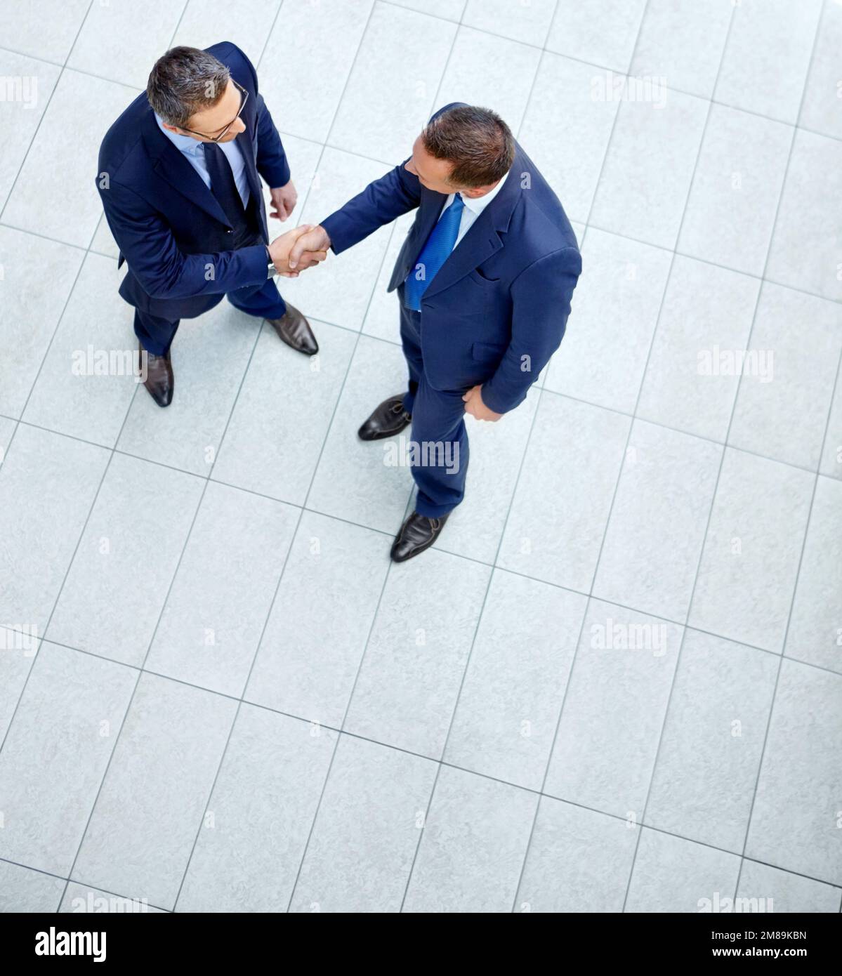 Top view handshake financial hi-res stock photography and images - Alamy