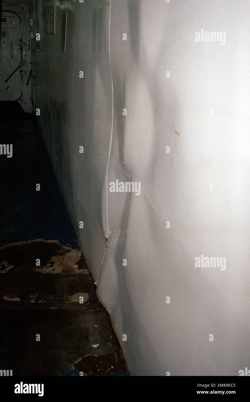 A close-up view of buckling in a bulkhead aboard the guided missile ...