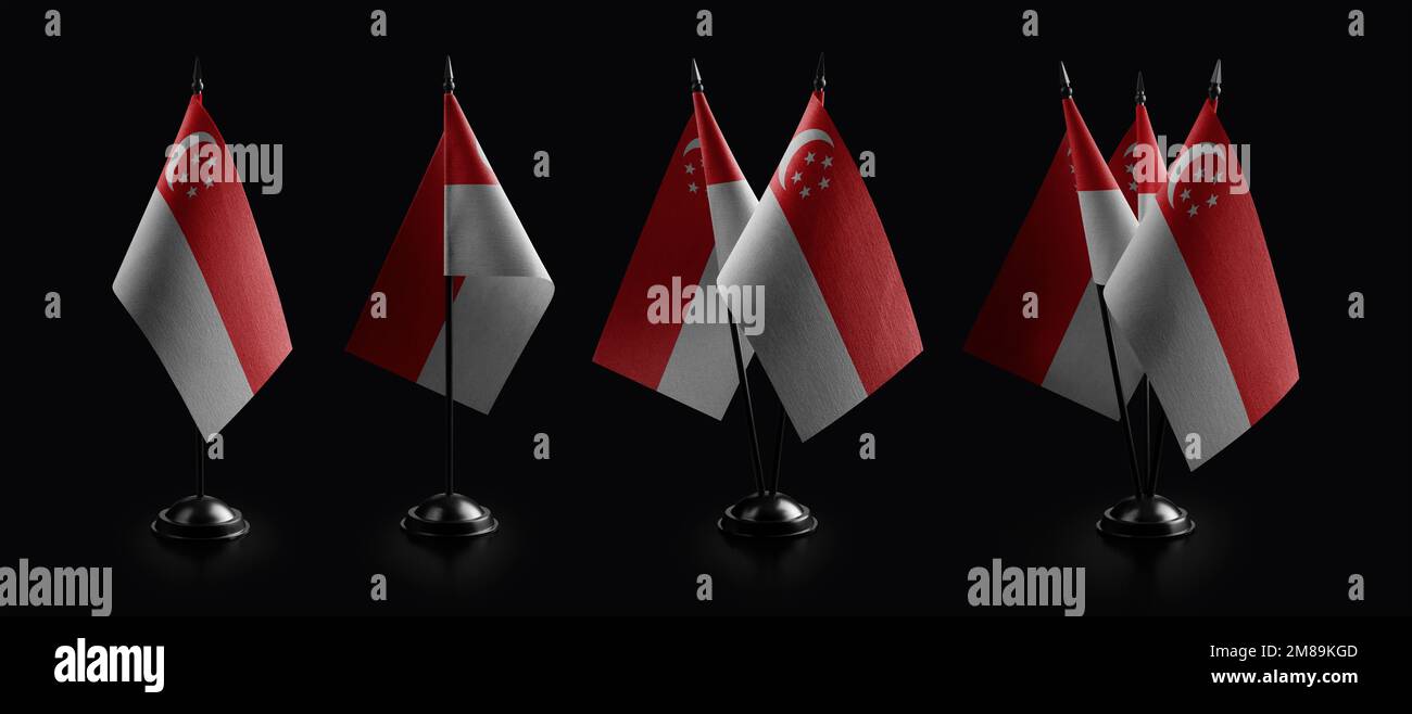 Small national flags of the Singapore on a black background Stock Photo ...