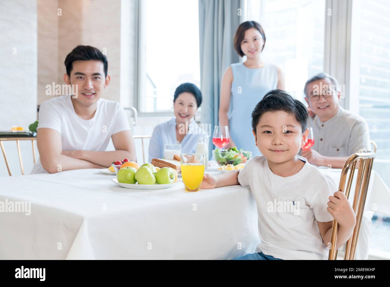 Happy family dinner party Stock Photo - Alamy