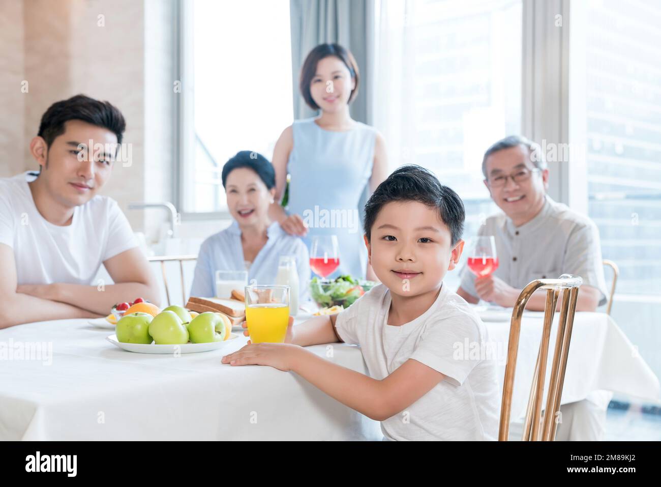 Happy family dinner party Stock Photo - Alamy