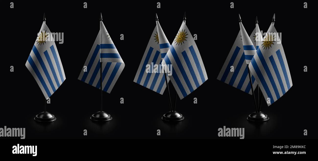 Small national flags of the Uruguay on a black background Stock Photo ...