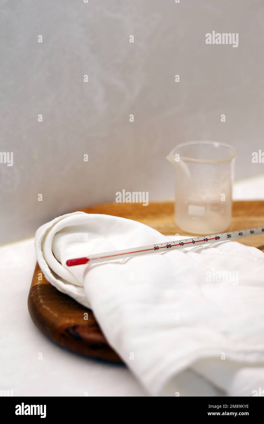 The beaker and the gradations on a thermometer in the laboratory Stock ...