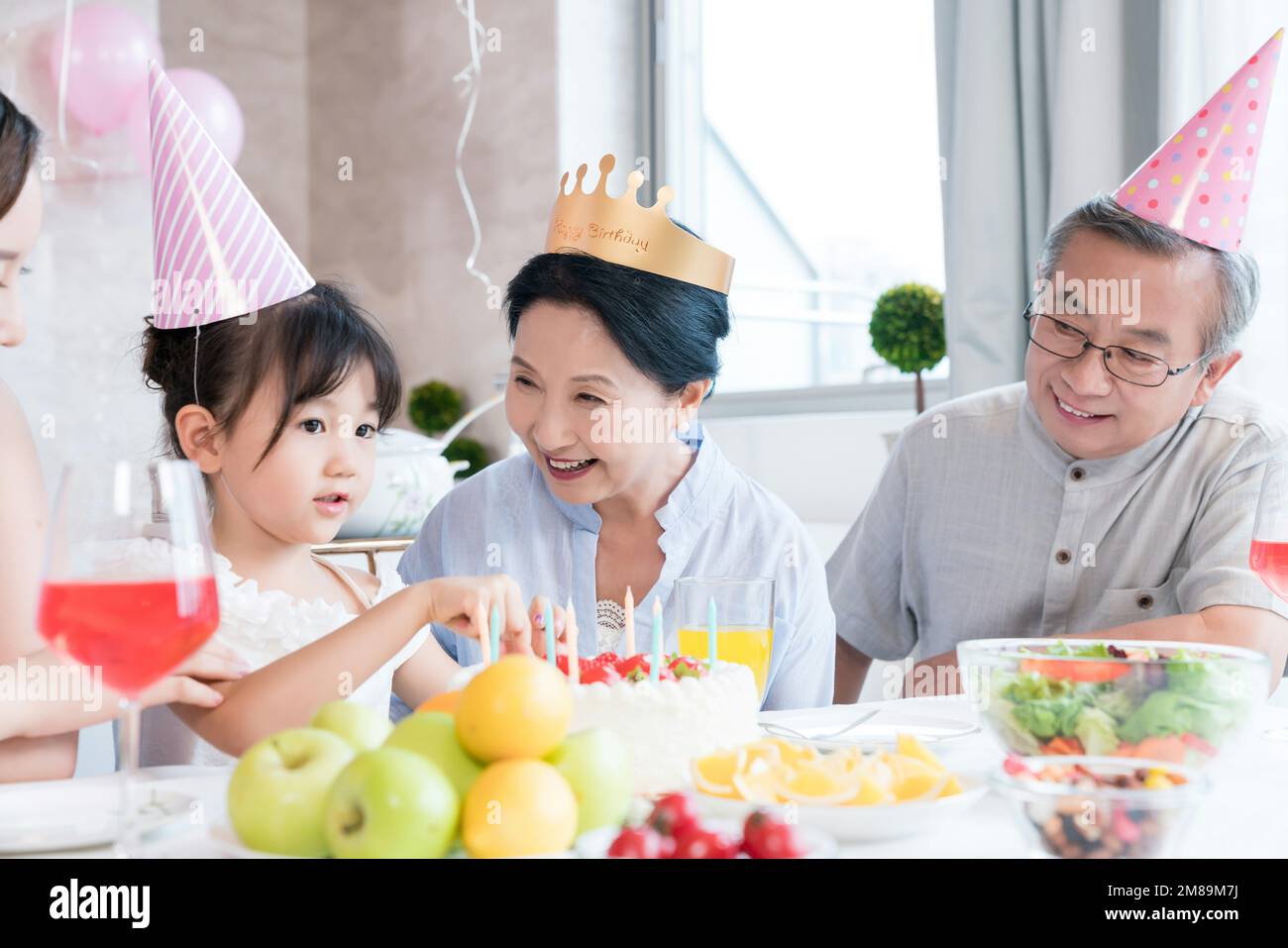 Happy family four sit hi-res stock photography and images - Alamy