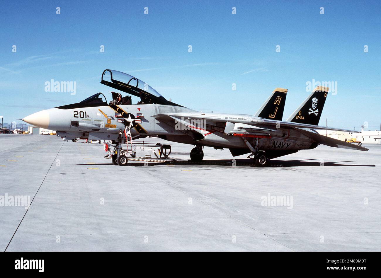 A left side view of a Fighter Squadron 84 (VF-84) F-14A Tomcat aircraft ...