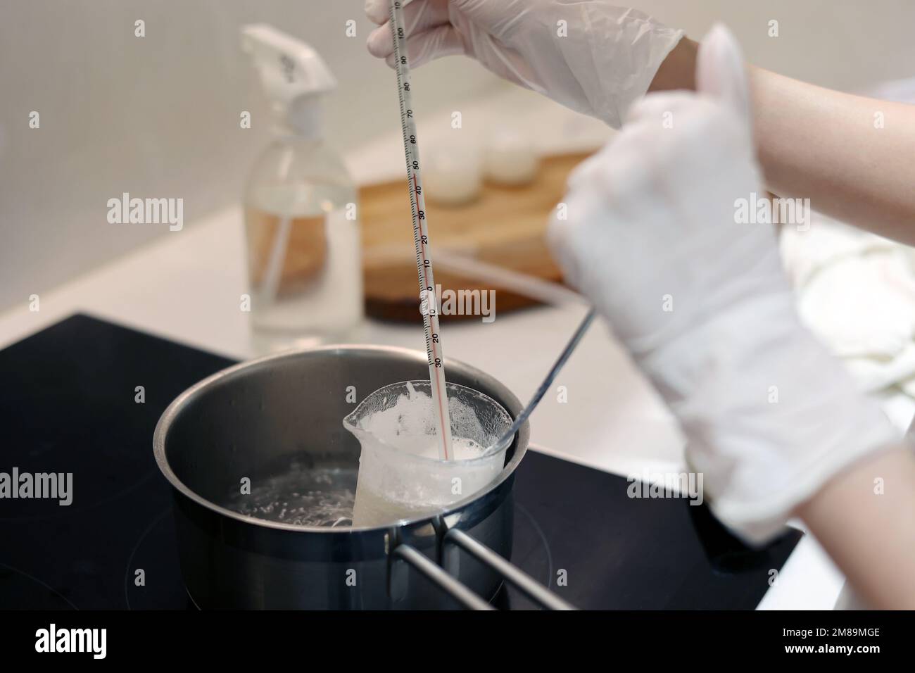Heat beaker of water and jojoba oil in boiling water, record the ...