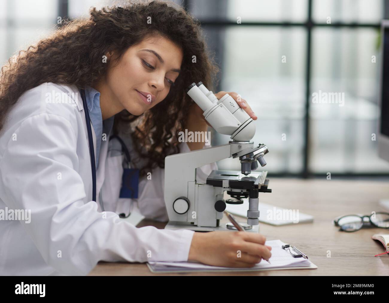 Scientist in laboratory conducting hi-res stock photography and images ...