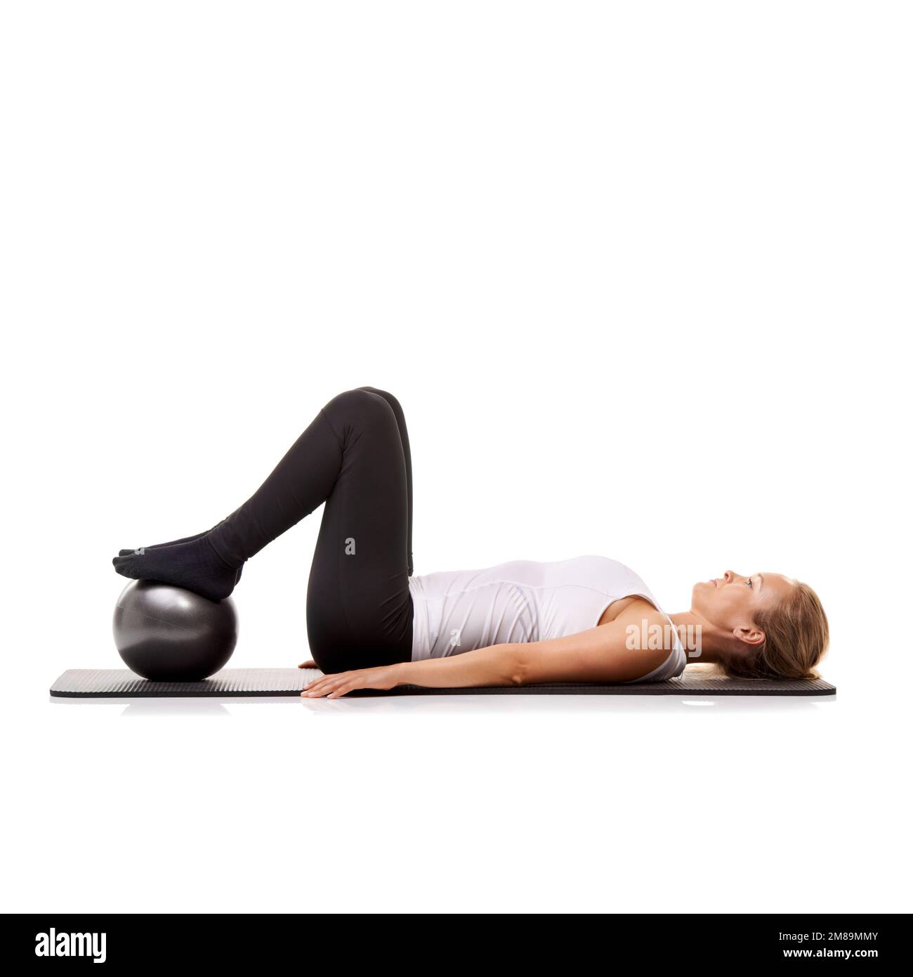 Working out forms part of her daily routine. A young woman using an ...