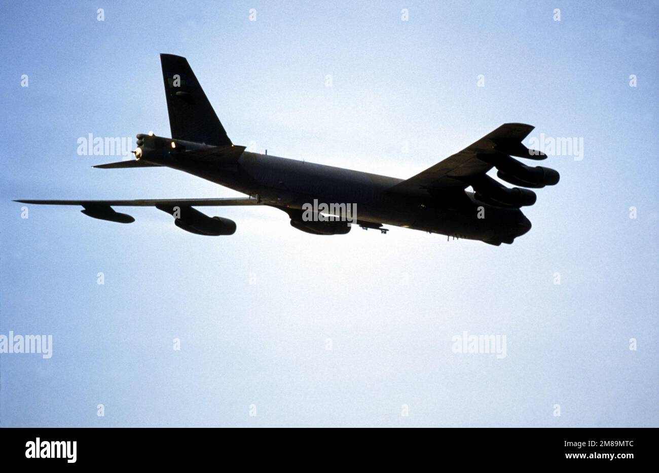 Right side view of a B-52 Stratofortress bomber taking off for a ...