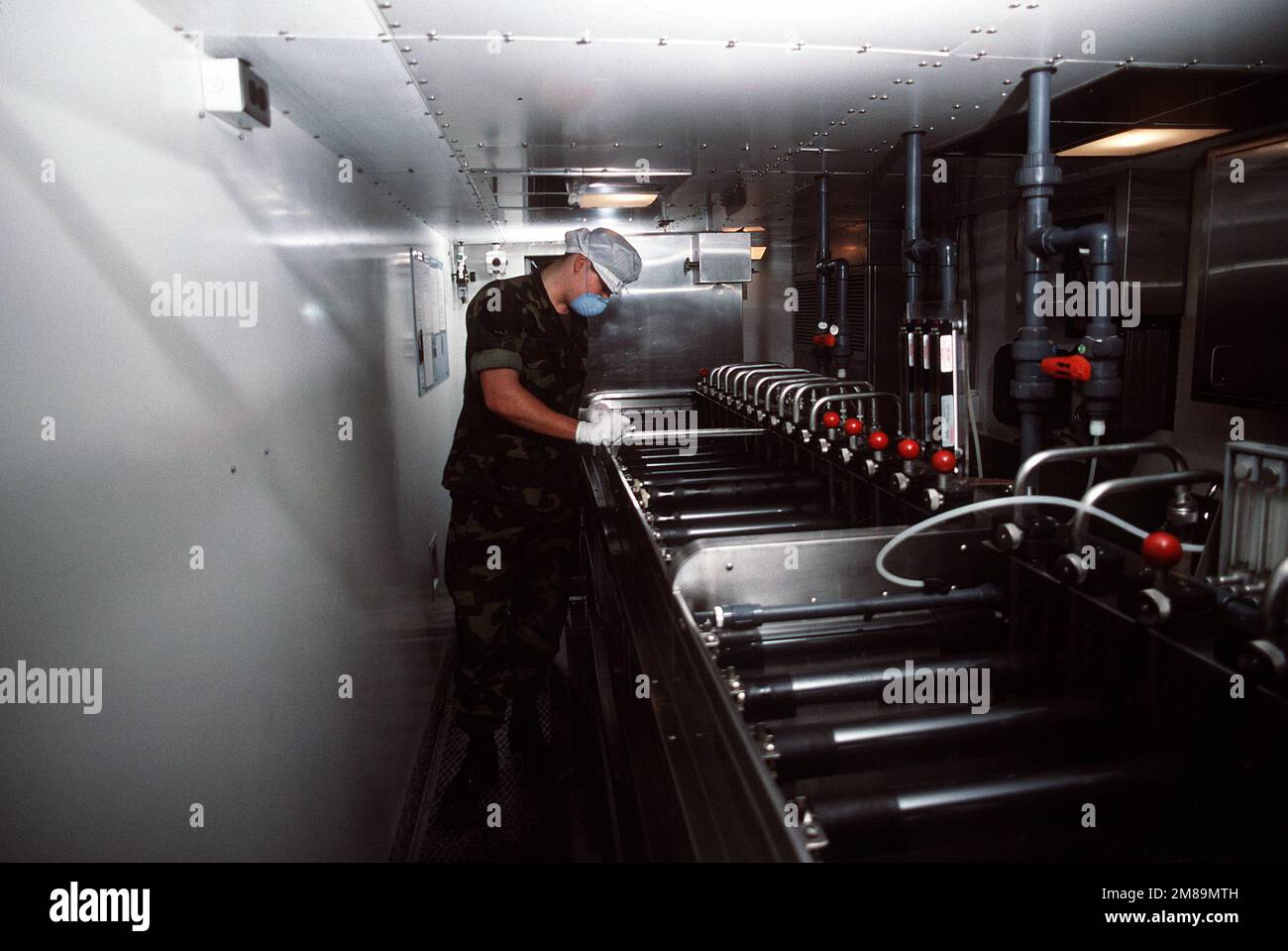 A1C Russ E. Cooley of Detachment 4, 9th Strategic Reconnaissance Wing ...