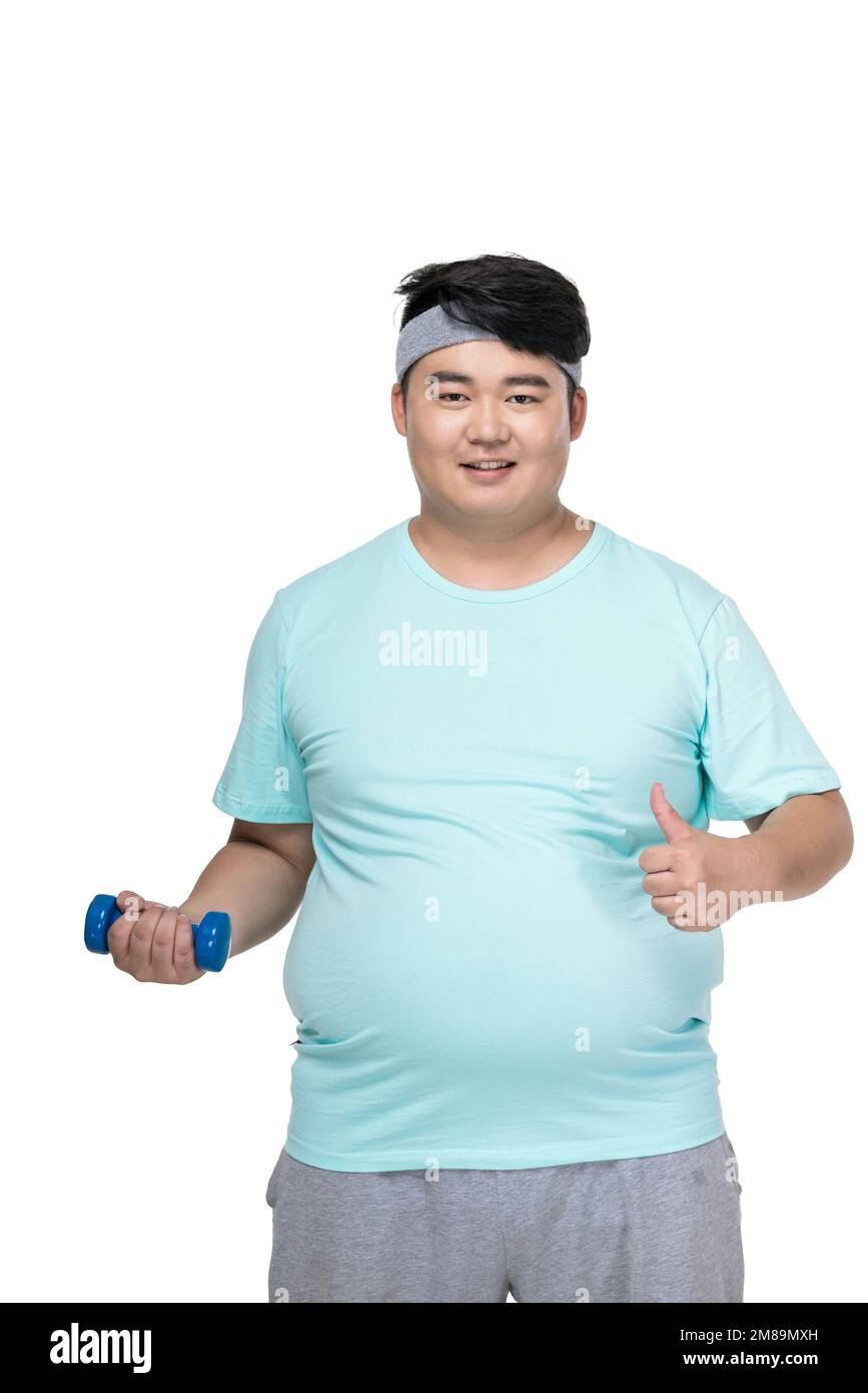 Fat young men in doing sports Stock Photo - Alamy