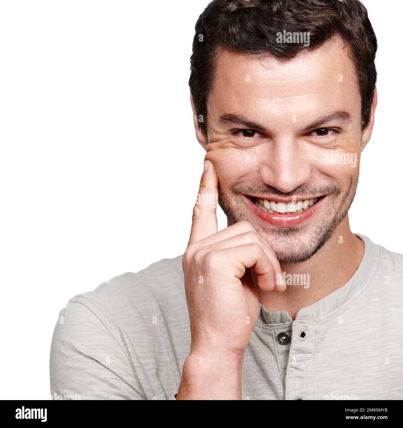 Man, studio portrait and happiness with smile, thinking and ideas by ...