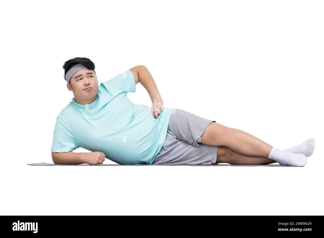 Fat young men in doing sports Stock Photo - Alamy