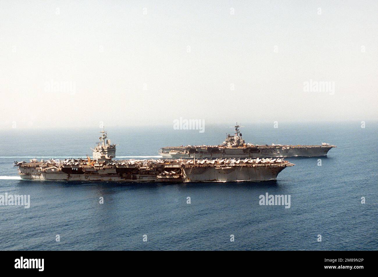A starboard view of the nuclear-powered aircraft carrier USS ENTERPRISE ...